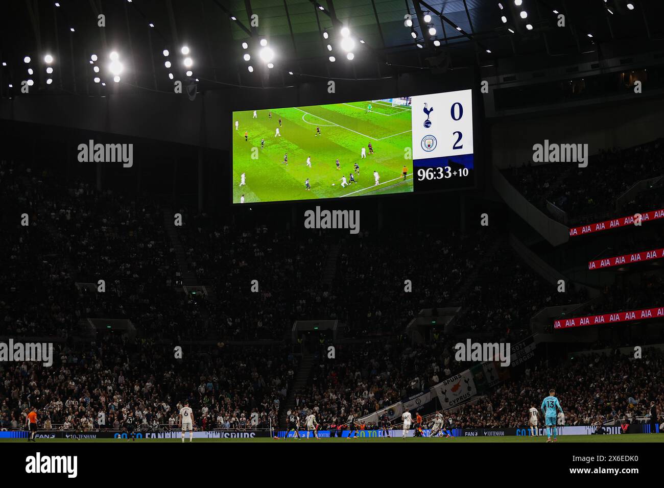 The big screen displays the 0-2 scoreline during the Premier League ...