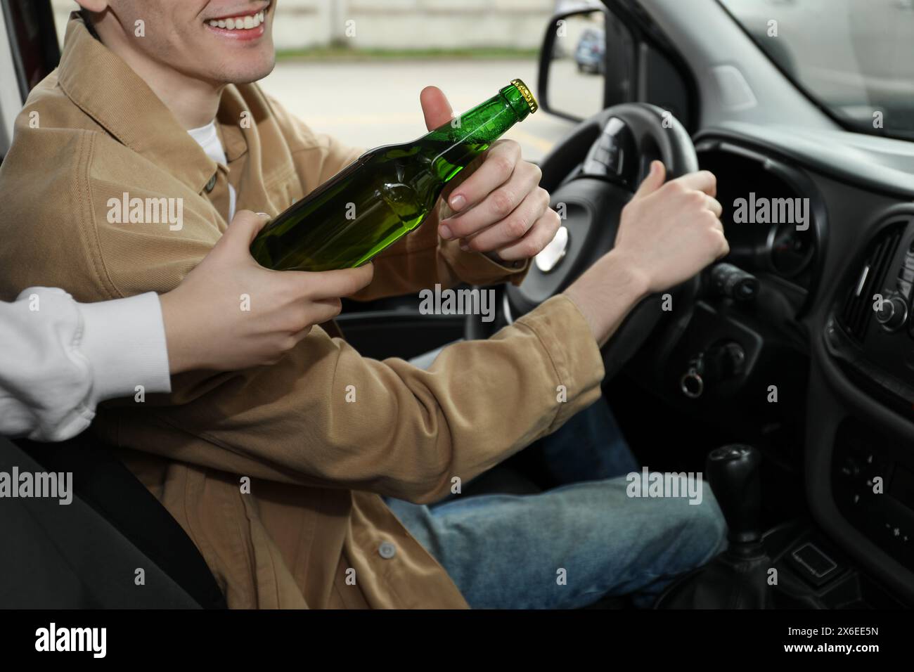 Drunk woman driving car beer hi-res stock photography and images - Alamy