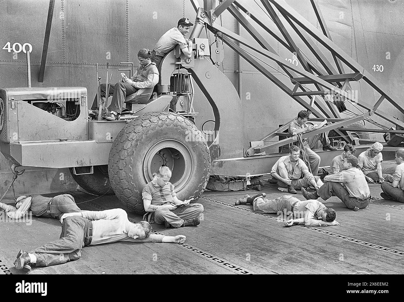 Enlisted men relaxing on flight deck of the USS Lexington (CV-16 ...