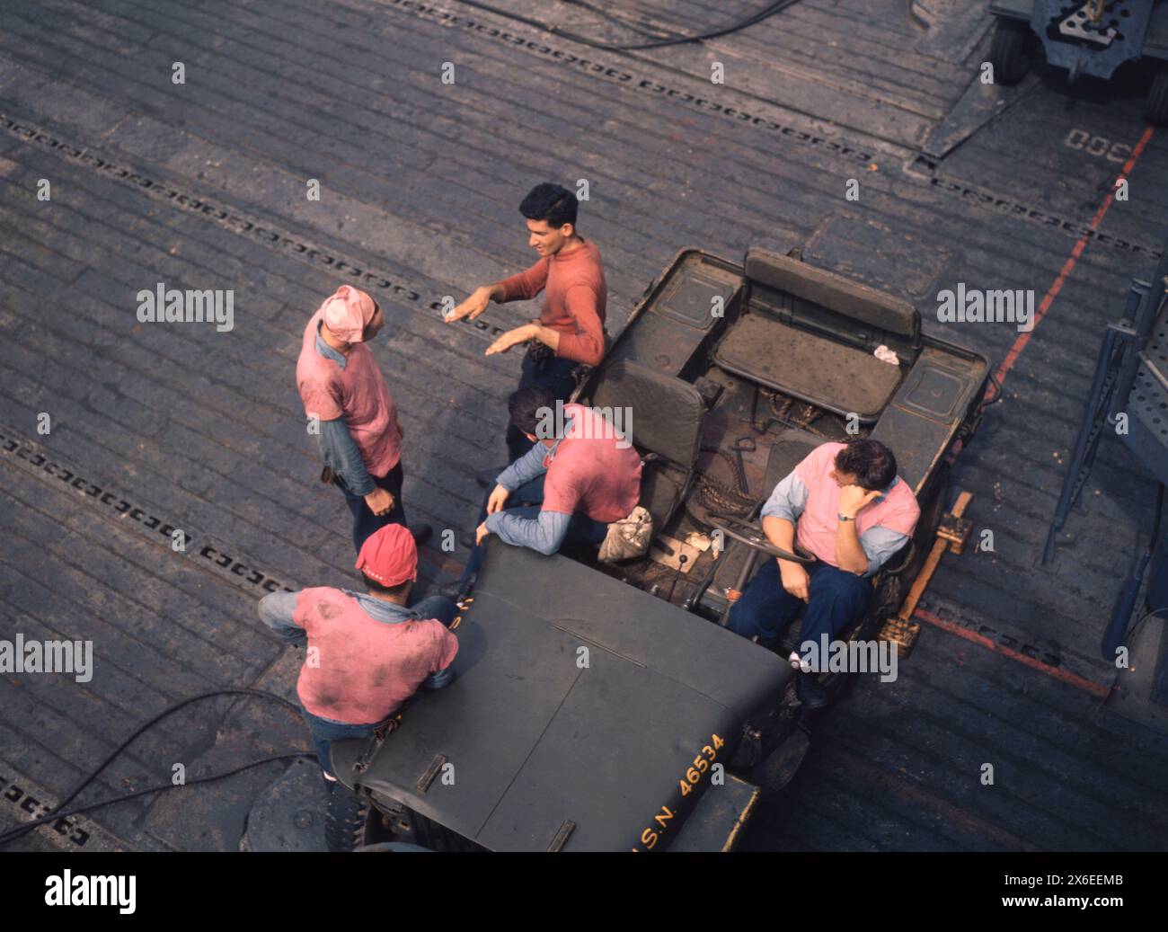 Gasoline Crew Relaxes Around Jeep on the USS Lexington (CVA-16) During ...