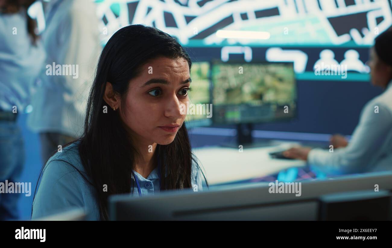 Indian employee monitoring traffic activity and communicating routes to ...