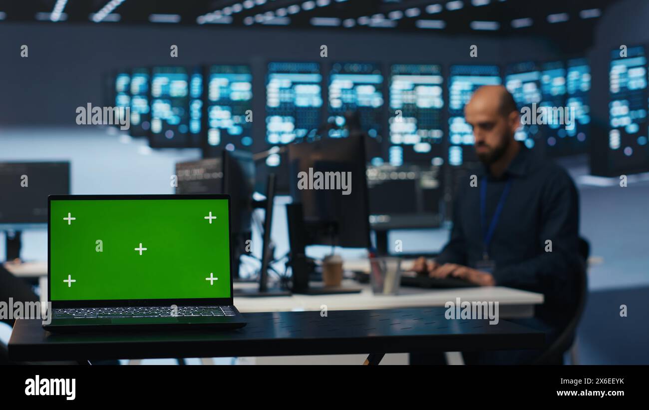Focus on isolated screen laptop device in data center used by admin to ... Focus on isolated screen laptop device in data center used by admin to ...
