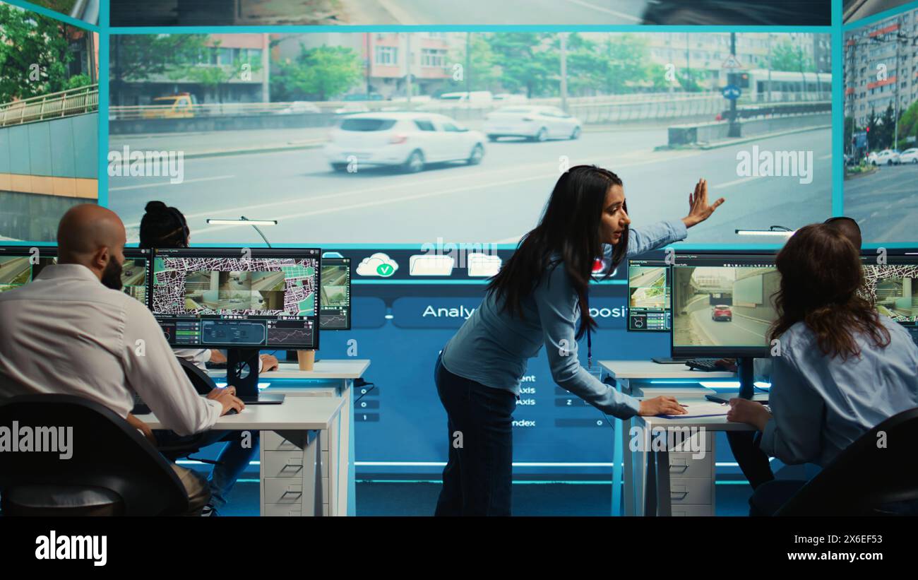 Indian supervisor leads her team to monitor the surveillance video ...