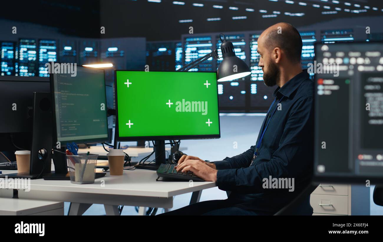 Admin Overseeing Server Room Running Code On Isolated Screen Computer Display Troubleshooting