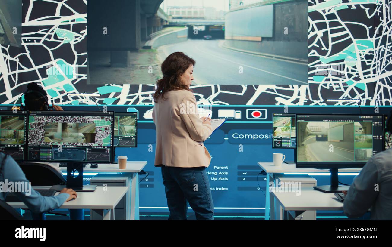 Manager supervising diverse employees operators in delivery call center office, people using ...