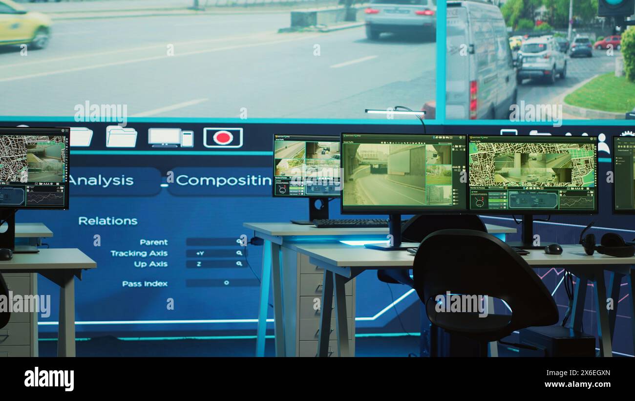 Empty observation room office with CCTV surveillance footage on a big ...