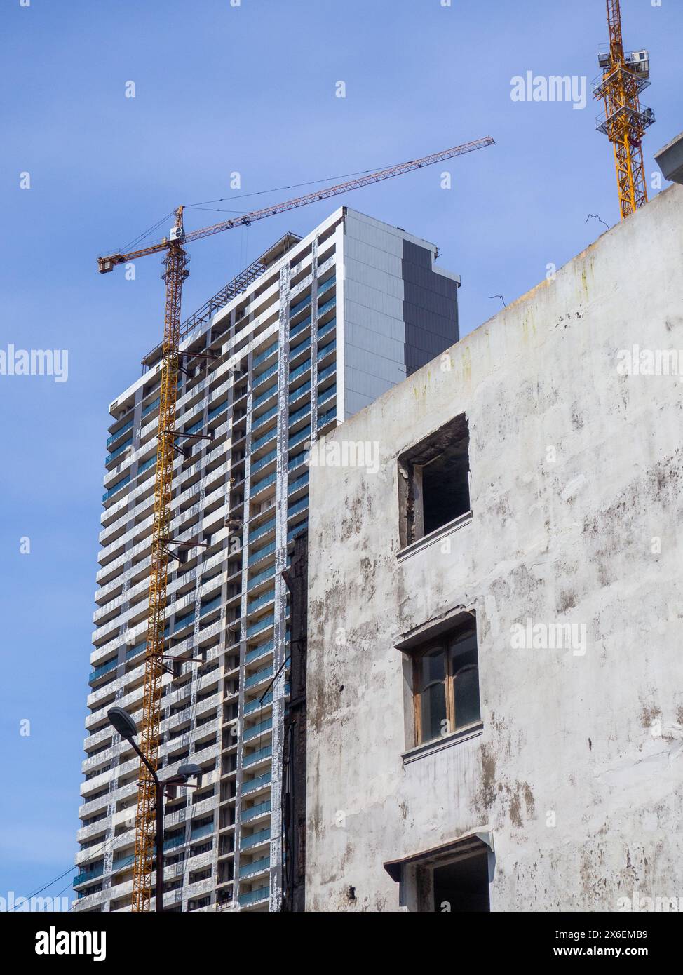 Construction industry. Old and new. Renovation. Construction of new ...