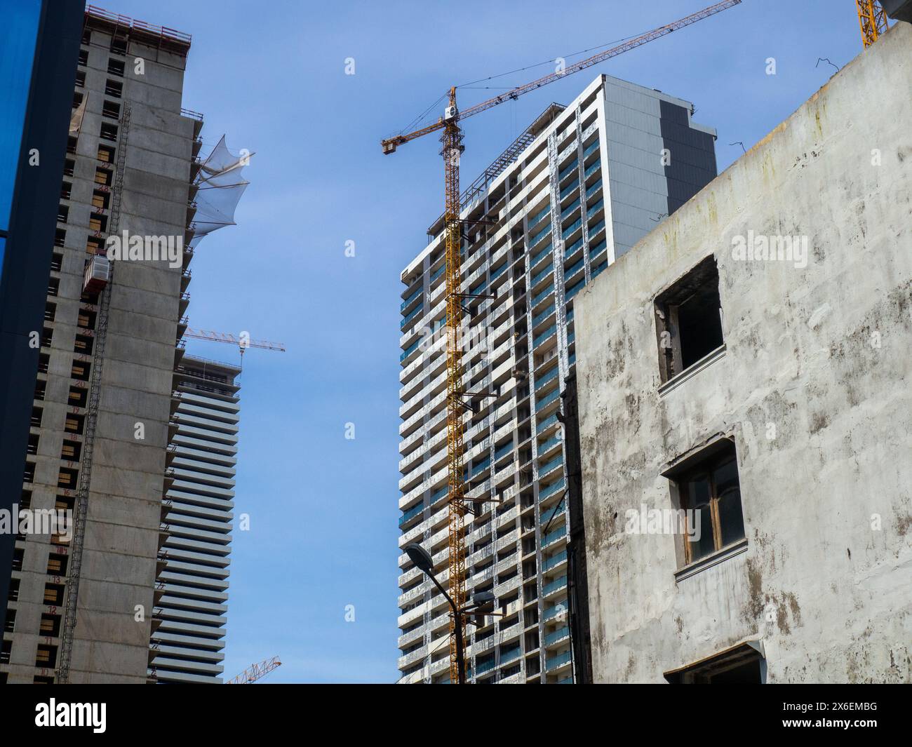 Construction industry. Old and new. Renovation. Construction of new ...