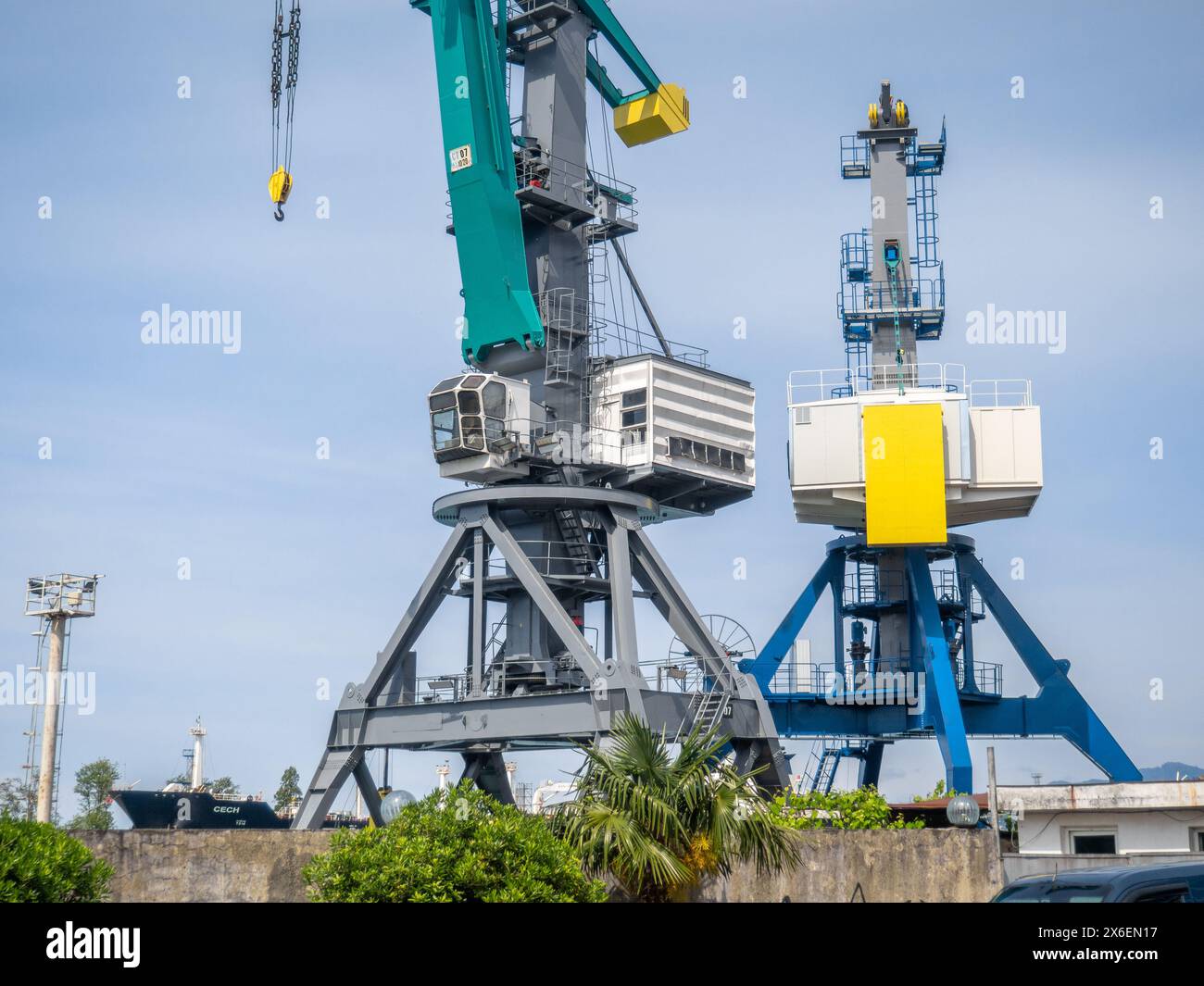 Seaport concept. crane in the seaport. Cargo port crane. Logistics ...