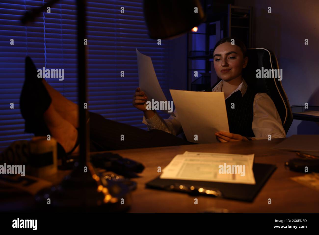 Professional detective working documents hi-res stock photography and ...