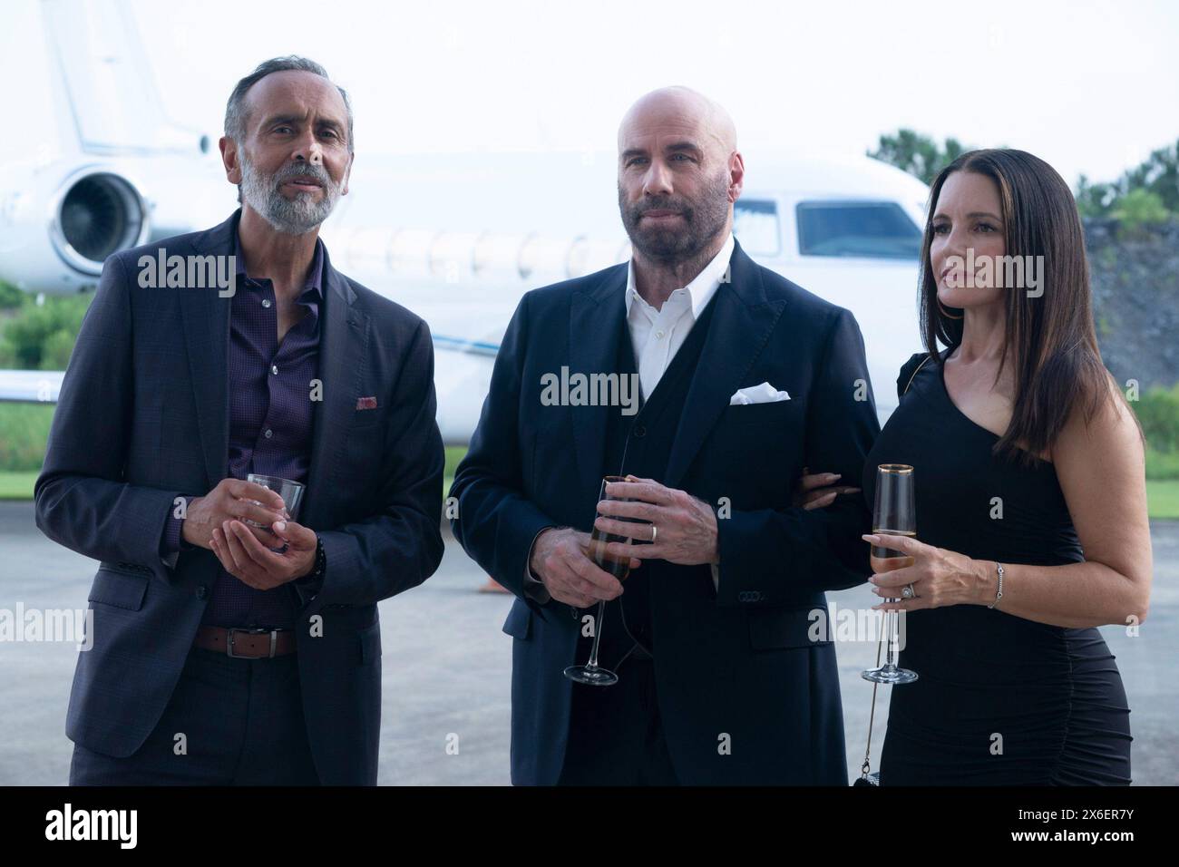 CASH OUT, from left: Demian Castro, John Travolta, Kristin Davis, 2024 ...