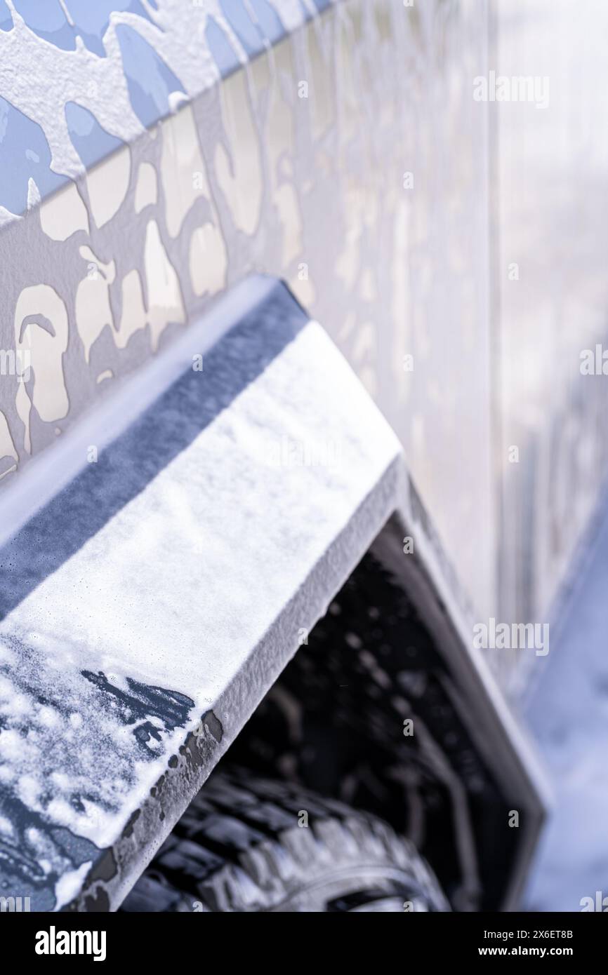 Close-up of Tesla Cybertruck Wheel and Body Covered in Soap Stock Photo ...