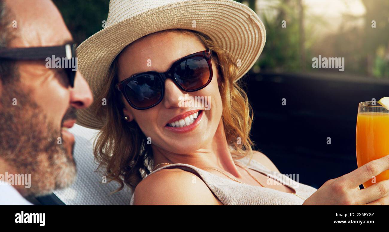 Cocktail, relax and couple on hotel terrace with smile, sunglasses and ...