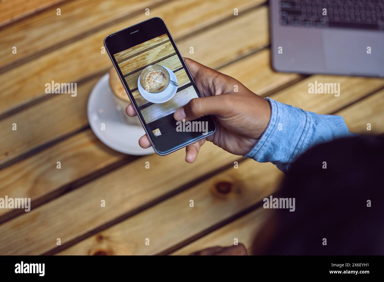 Hand, person and smartphone for coffee photography in table at cafe for ...