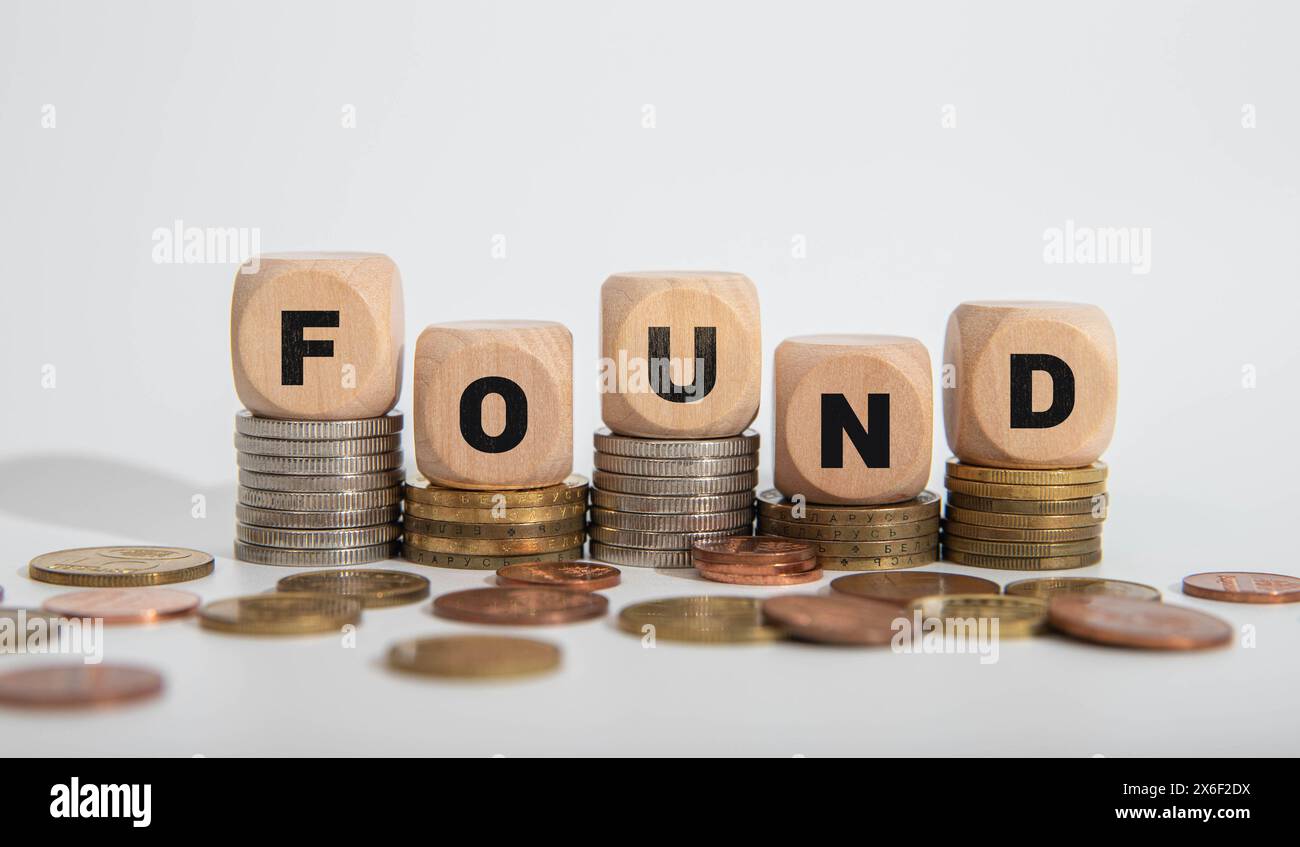 hand writes chalk text on blackboard - LOST and FOUND Stock Photo - Alamy