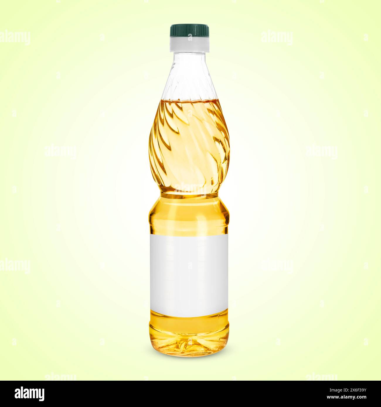 Cooking oil in plastic bottle with empty label on light yellow ...