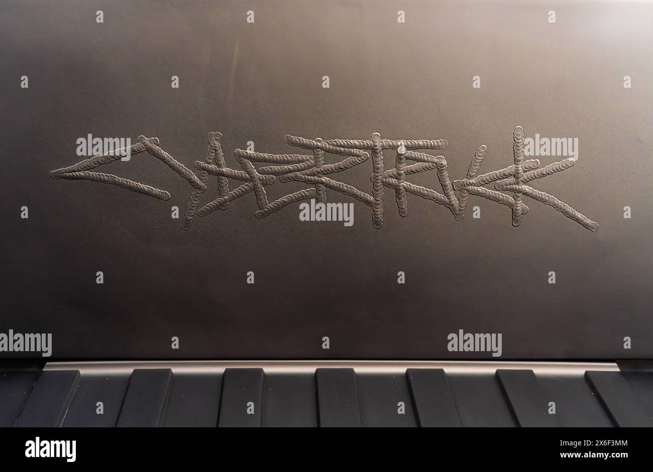 Engraved Logo Detail Inside the Open Frunk of a Tesla Cybertruck Stock ...