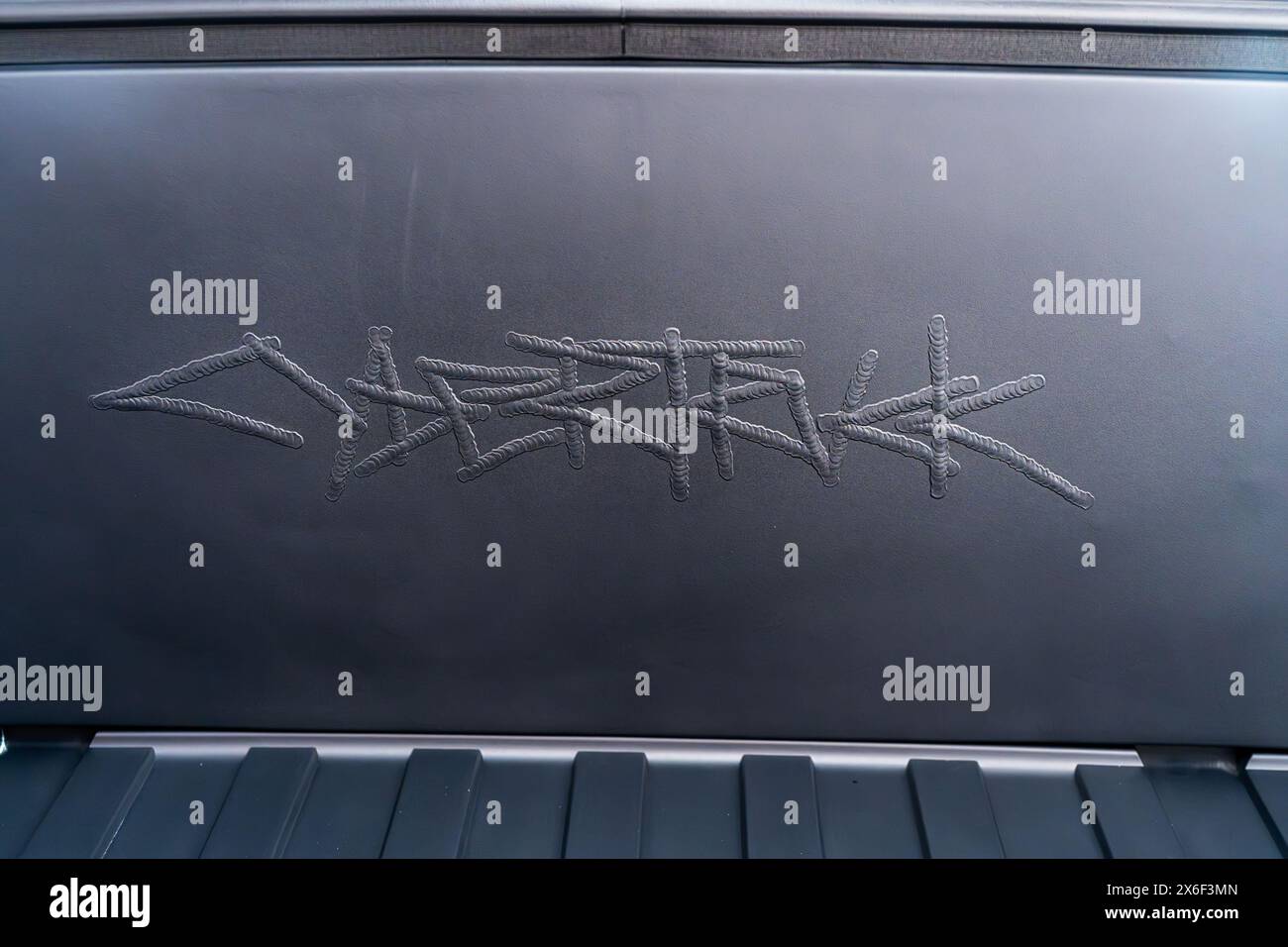 Engraved Logo Detail Inside the Open Frunk of a Tesla Cybertruck Stock ...