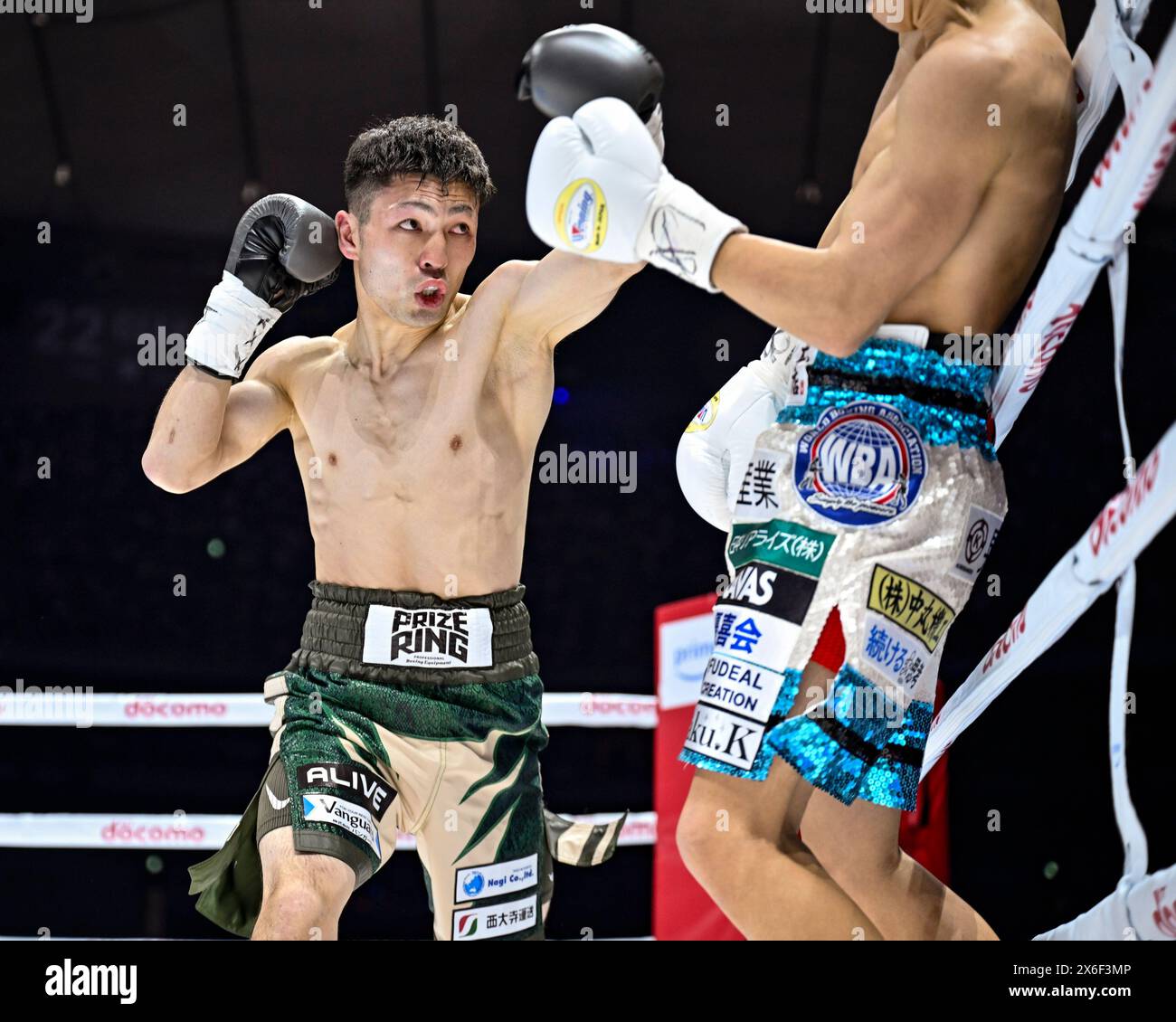 Seigo Yuri Akui (black gloves) of Japan and Taku Kuwahara (white gloves ...