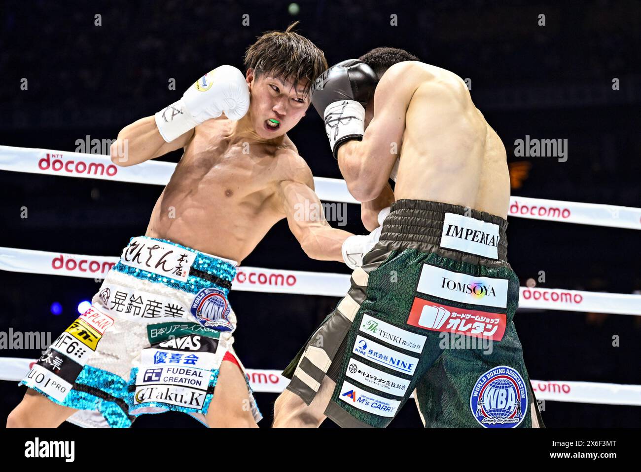 Seigo Yuri Akui (black gloves) of Japan and Taku Kuwahara (white gloves ...
