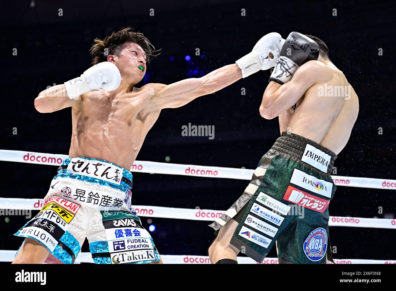 Seigo Yuri Akui (black gloves) of Japan and Taku Kuwahara (white gloves ...