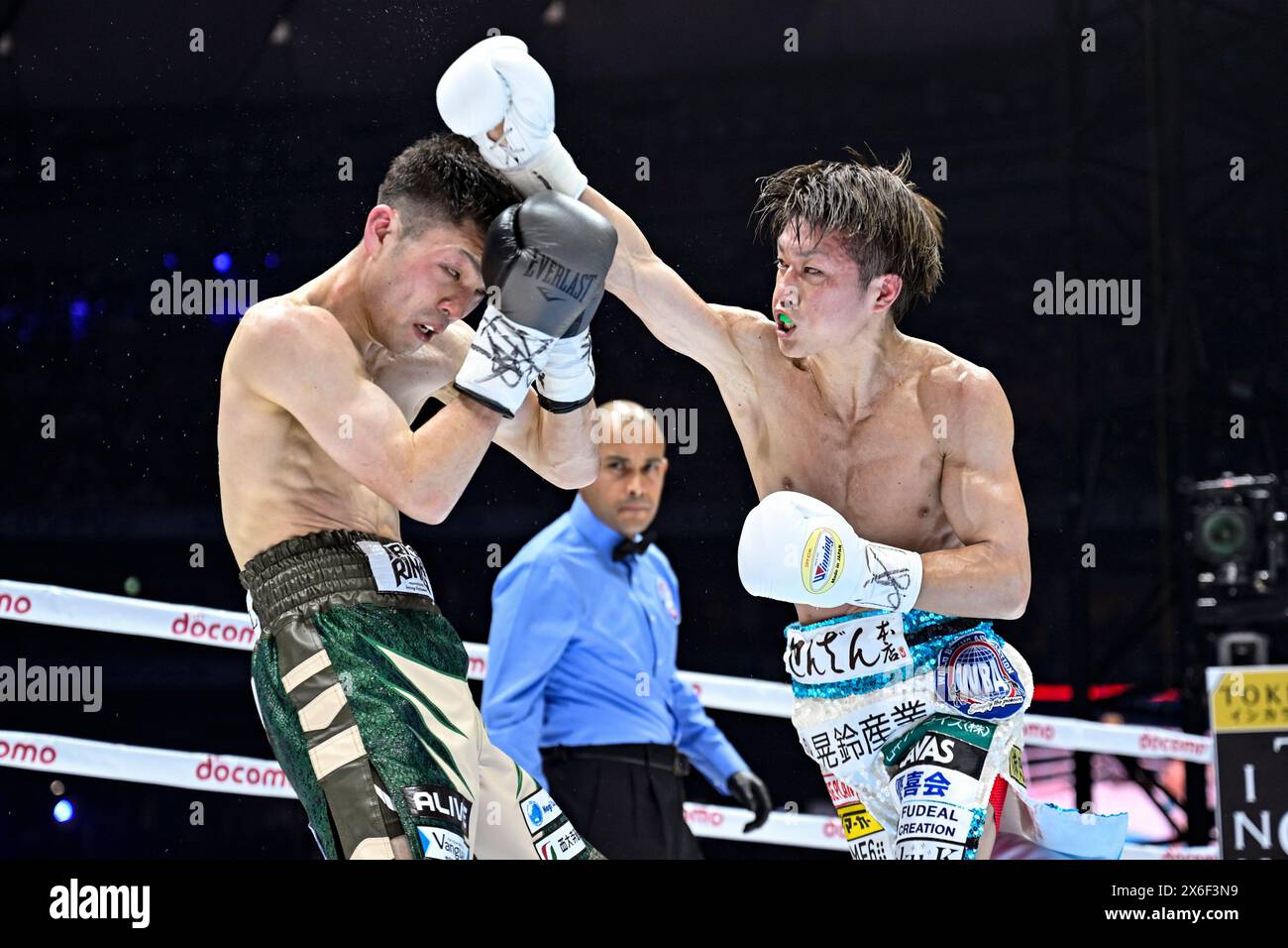 Seigo Yuri Akui (black gloves) of Japan and Taku Kuwahara (white gloves ...