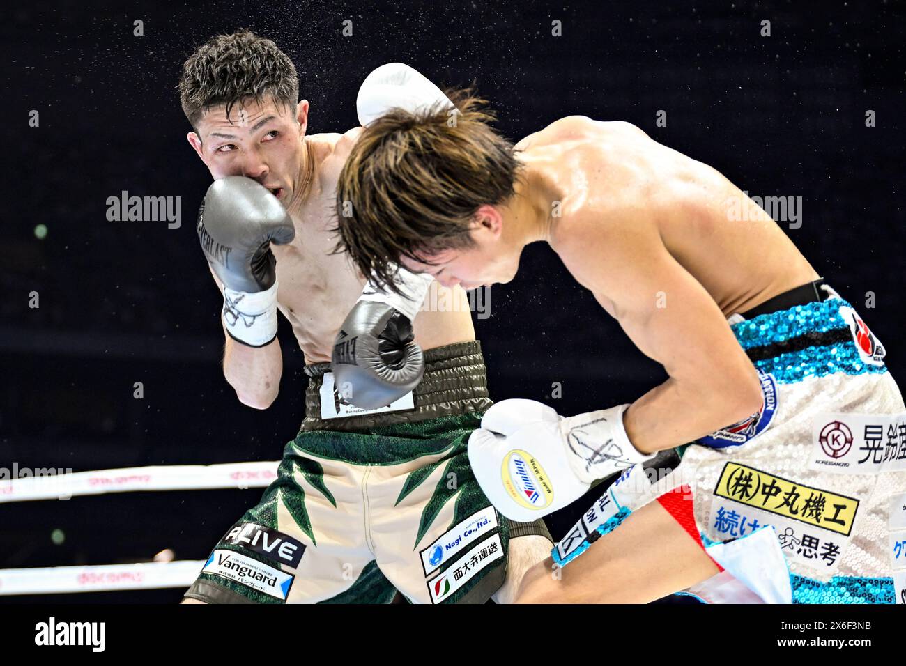 Seigo Yuri Akui (black gloves) of Japan and Taku Kuwahara (white gloves ...