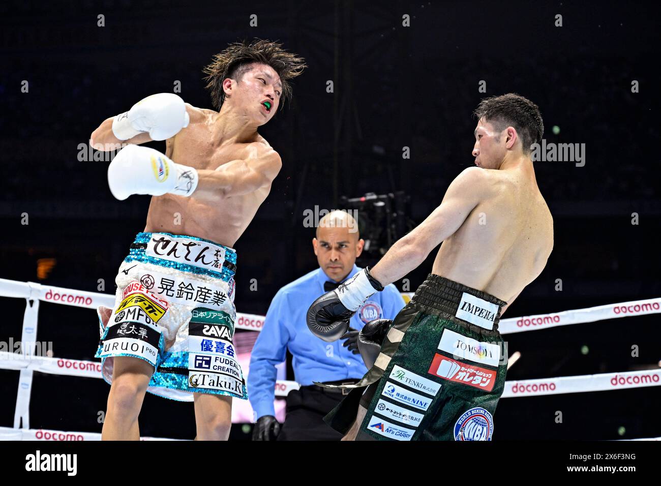 Seigo Yuri Akui (black gloves) of Japan and Taku Kuwahara (white gloves ...