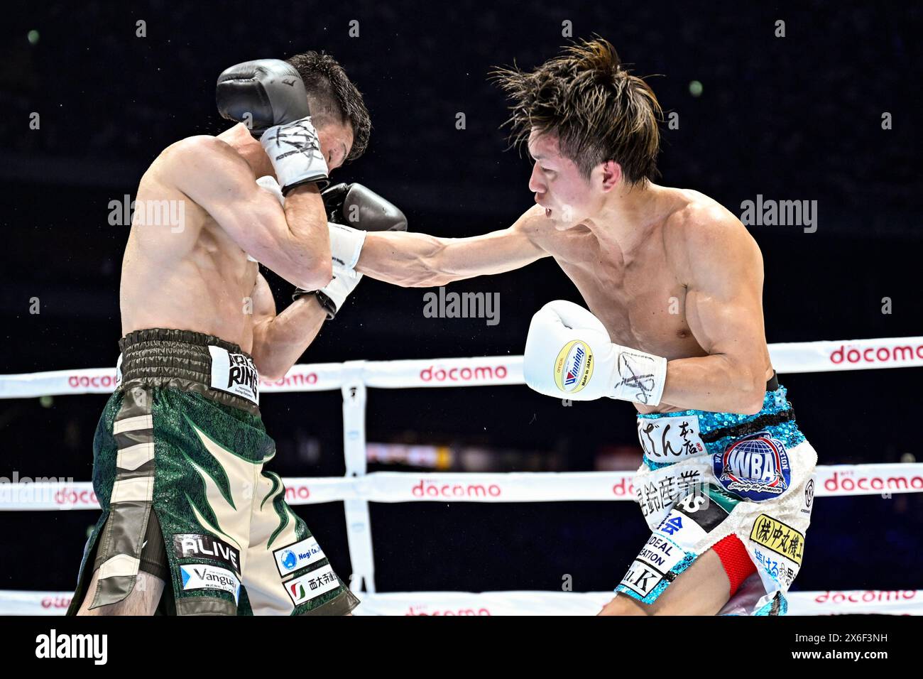 Seigo Yuri Akui (black gloves) of Japan and Taku Kuwahara (white gloves ...