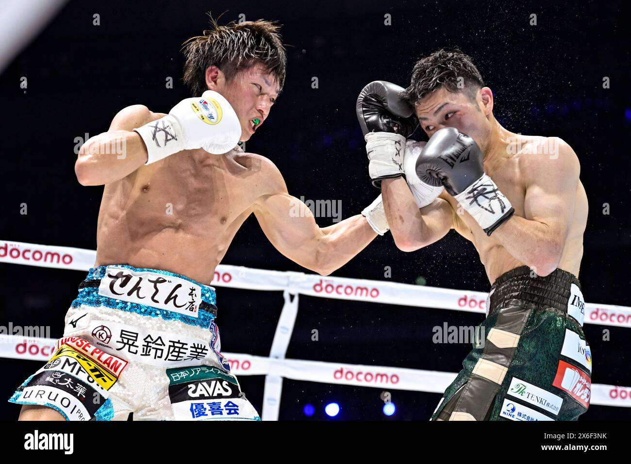 Seigo Yuri Akui (black gloves) of Japan and Taku Kuwahara (white gloves ...