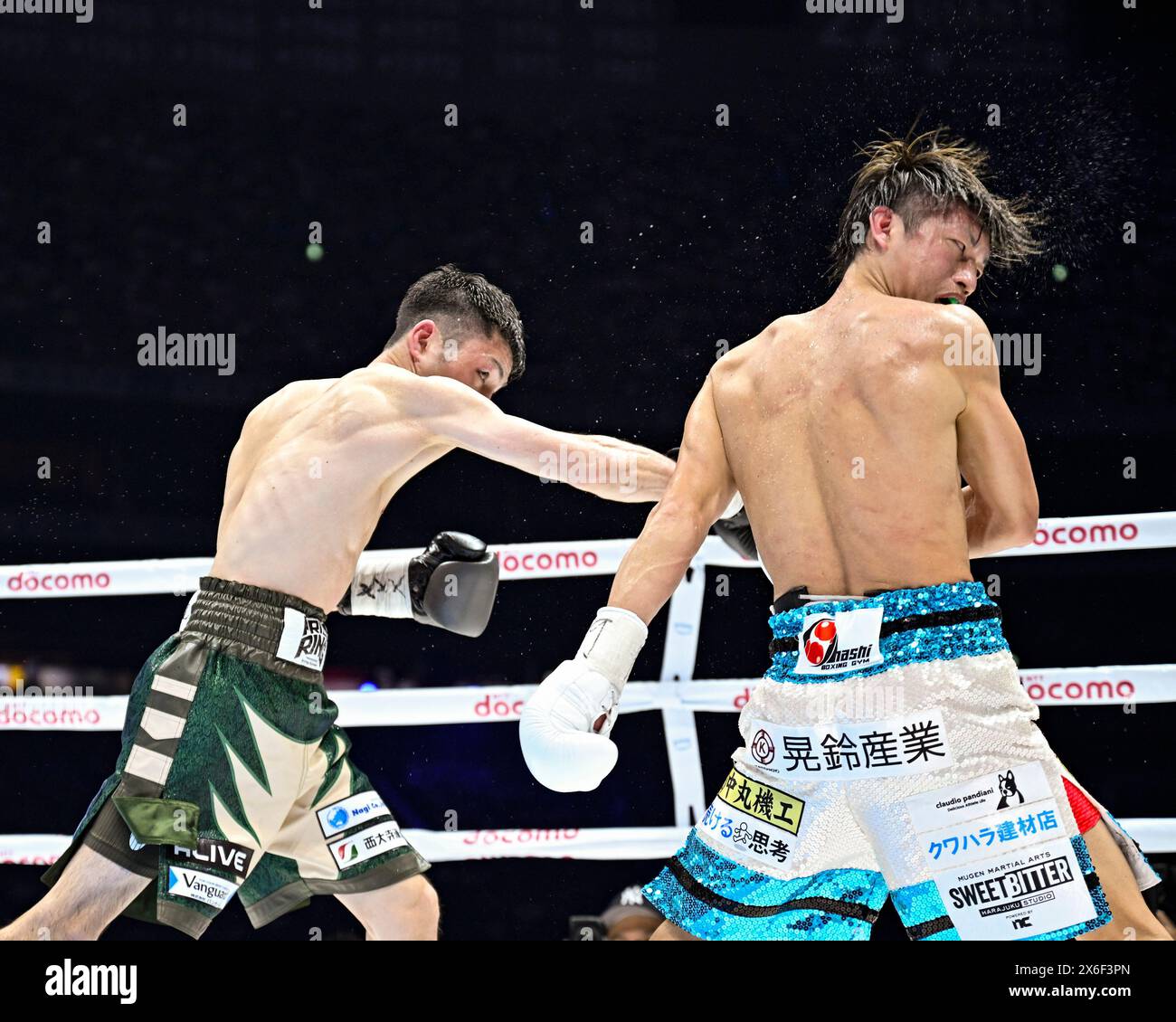 Seigo Yuri Akui (black gloves) of Japan and Taku Kuwahara (white gloves ...