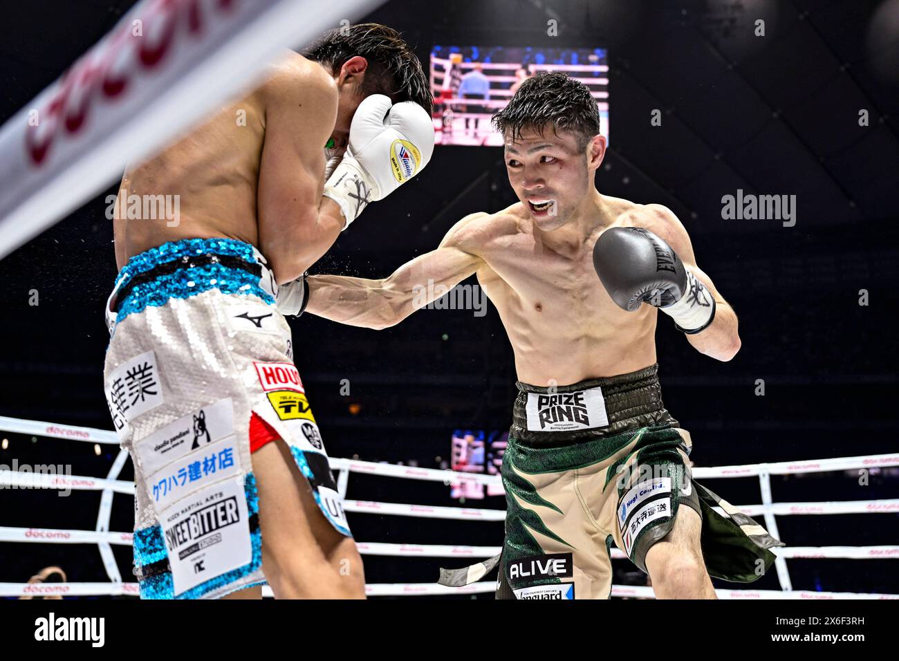 Seigo Yuri Akui (black gloves) of Japan and Taku Kuwahara (white gloves ...