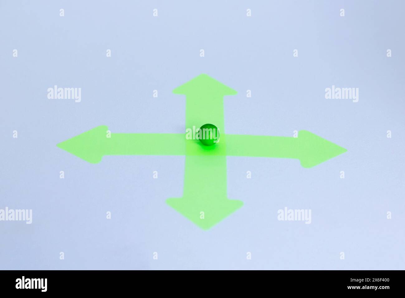 Sphere in the center of arrows that indicate different paths Stock ...