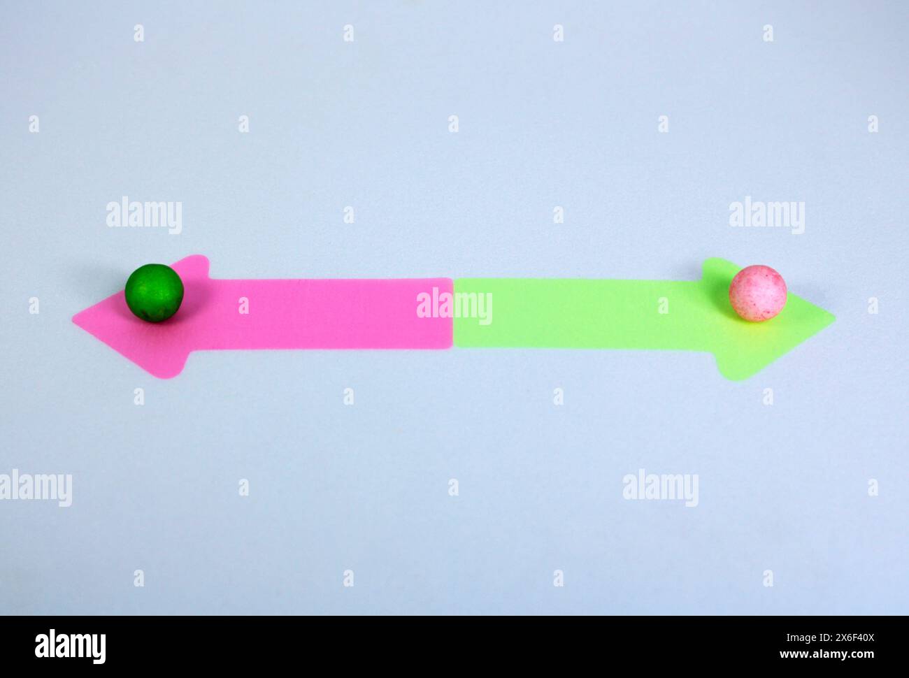 Spheres taking paths of the opposite color Stock Photo - Alamy