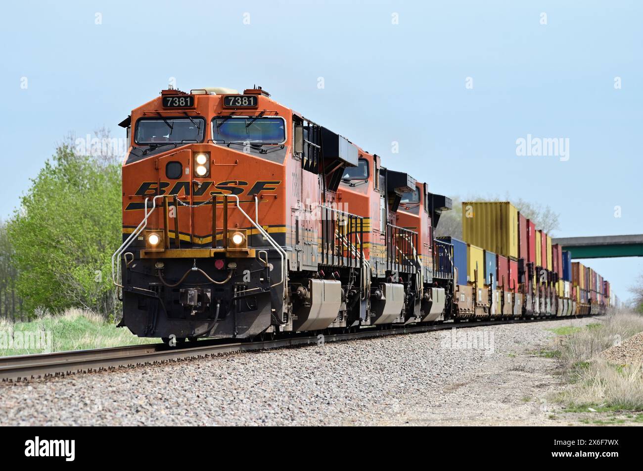 Shabbona, Illinois, USA. Three Burlington Northern Santa Fe locomotives lead an intermodal ...