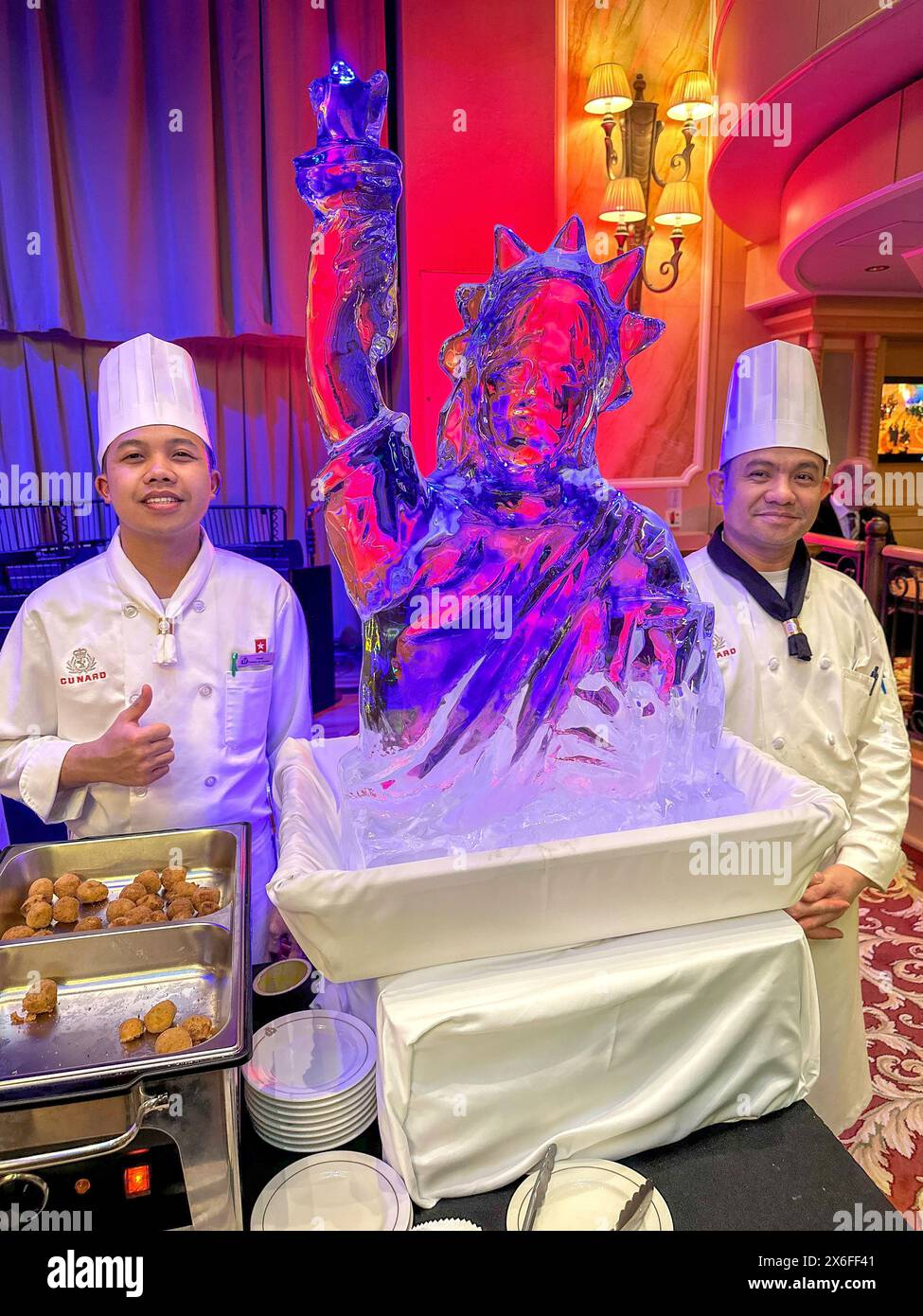 Chefs with 'Statue of Liberty' ice sculpture on board Cunard MS Queen ...
