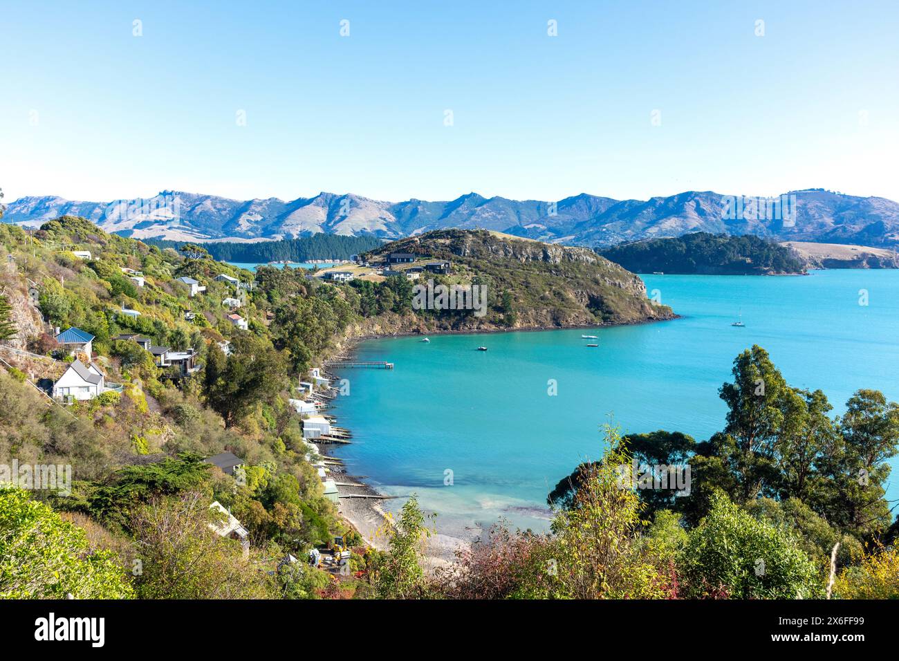 Pier sheds houses properties boating boat ramp on harbour marine hi-res ...