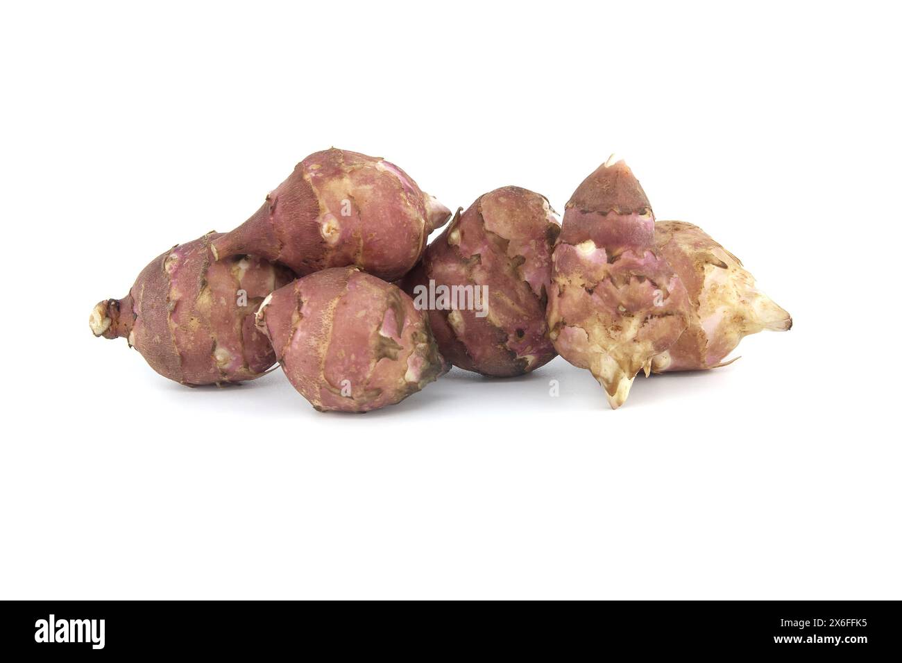 Sunchokes tubers isolated on white background. Jerusalem artichokes ...