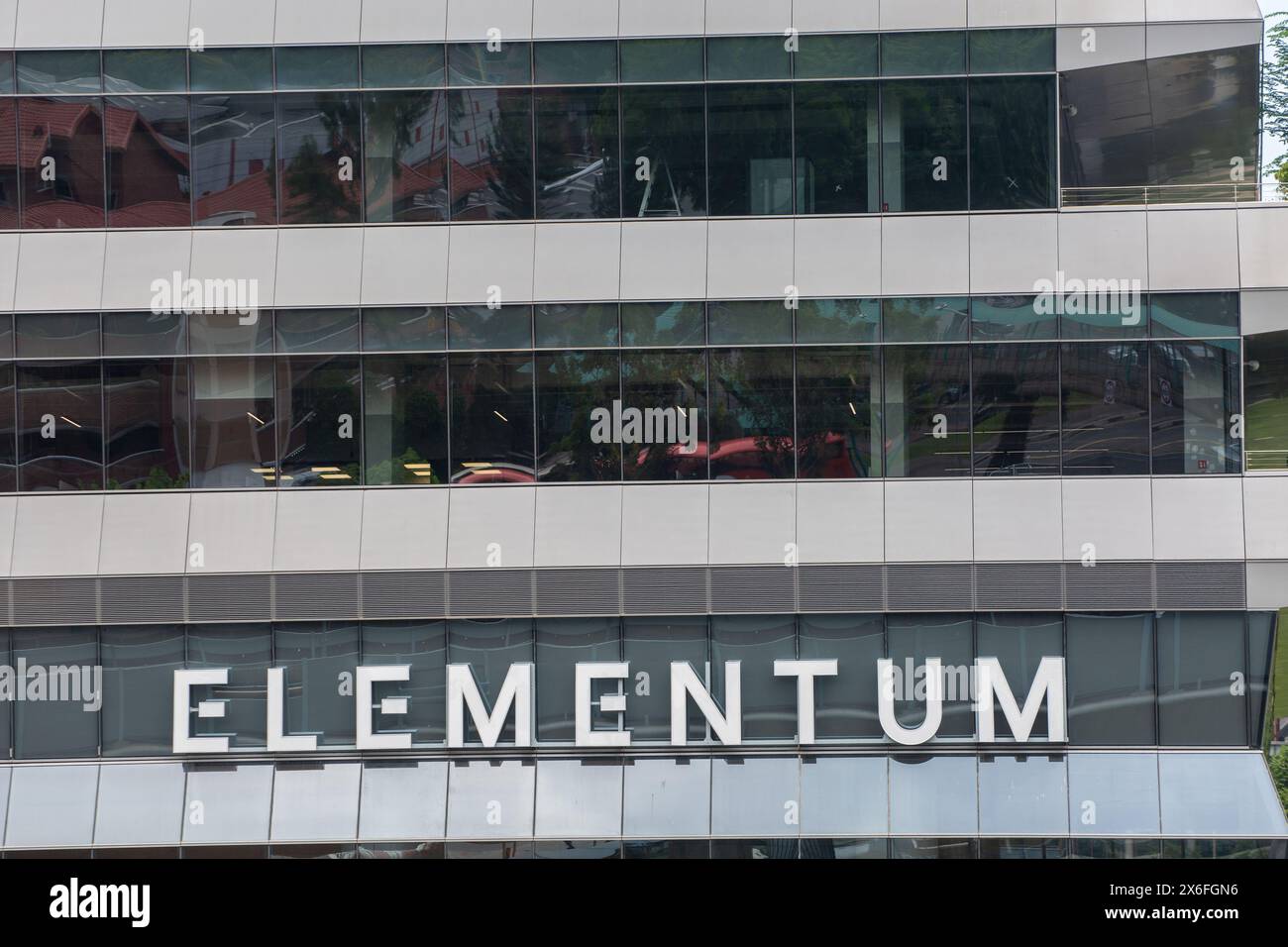 Elementum logo signboard mounted on modern commercial building facility ...