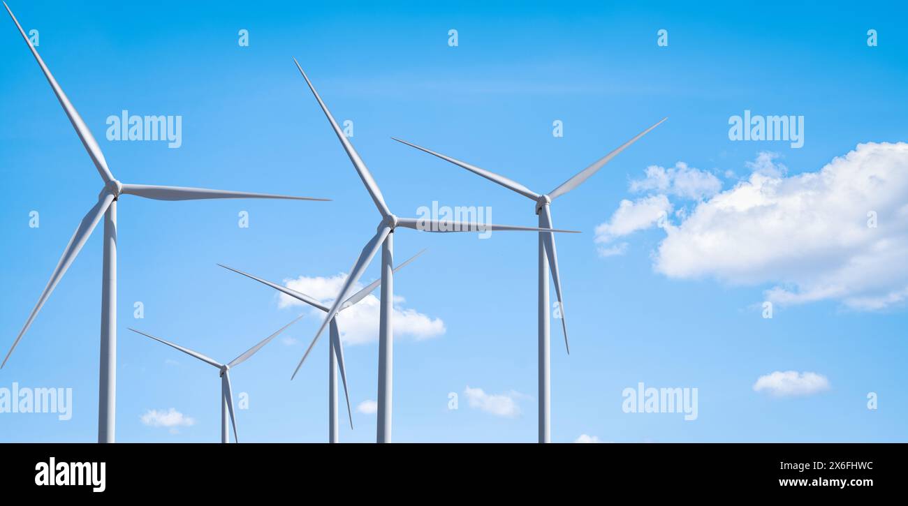 A group of wind turbines against blue sky, Wind energy. Wind power ... A group of wind turbines against blue sky, Wind energy. Wind power ...