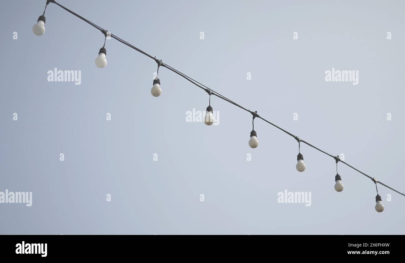 Hanging vintage light bulbs hi-res stock photography and images - Alamy