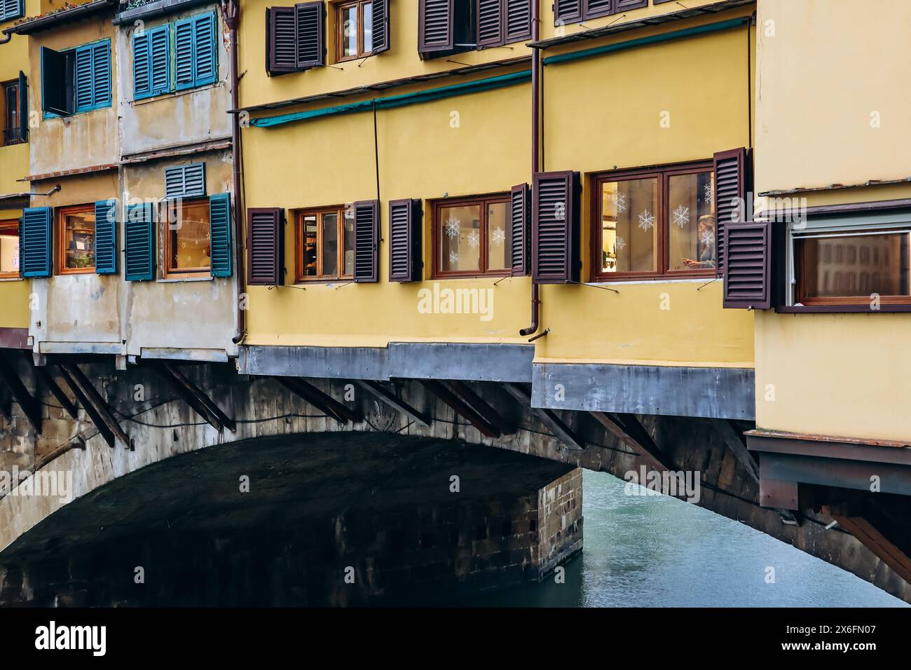 The Ponte Vecchio, a medieval stone closed-spandrel segmental arch ...