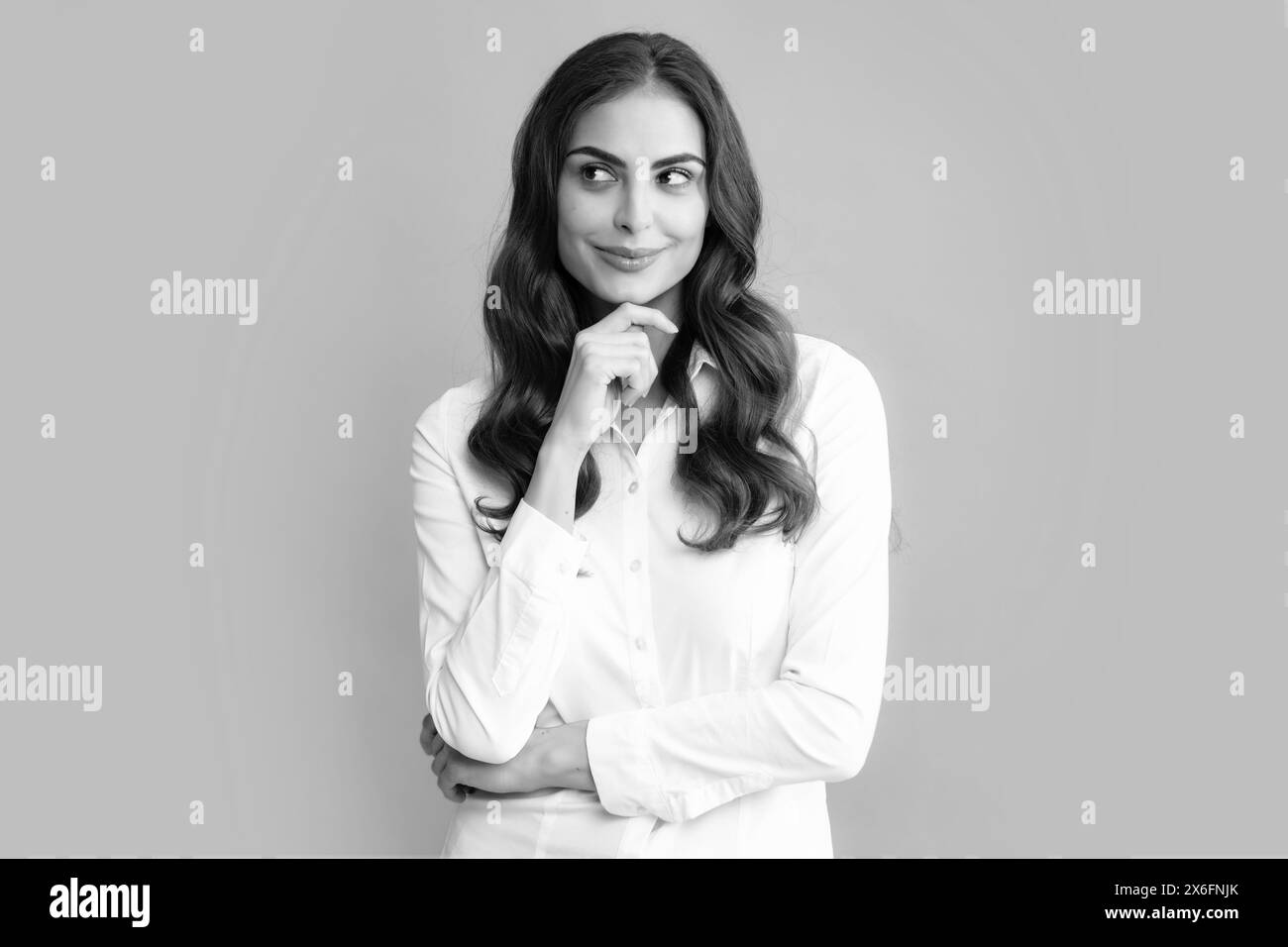Portrait of young woman girl thinking, looking up empty space ...