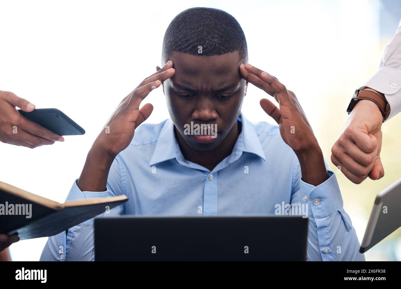 Business, man and stress with hands for multitasking with technology ...