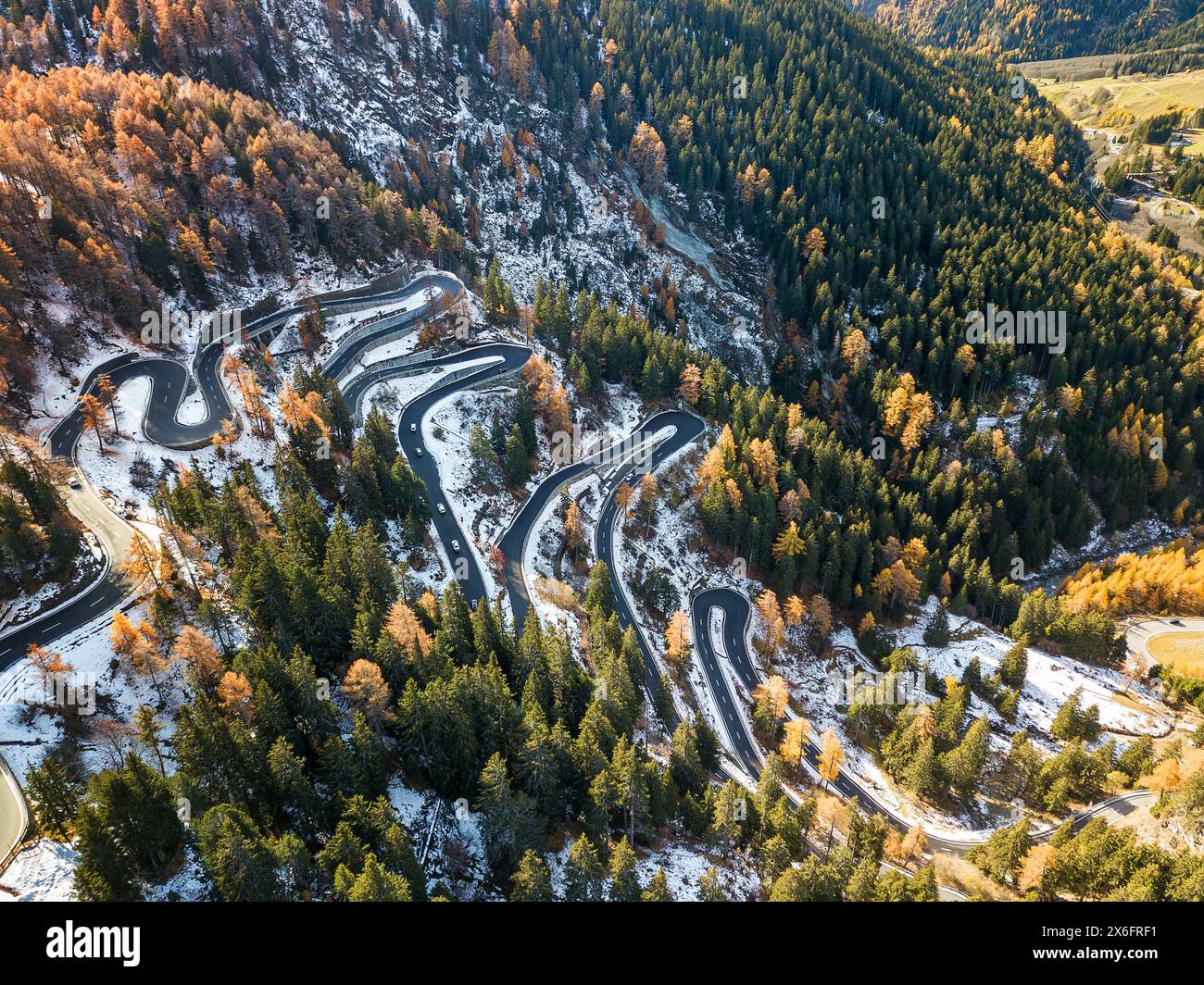 Aerial view by drone on the most spectacular pass road in Swiss Alps ...