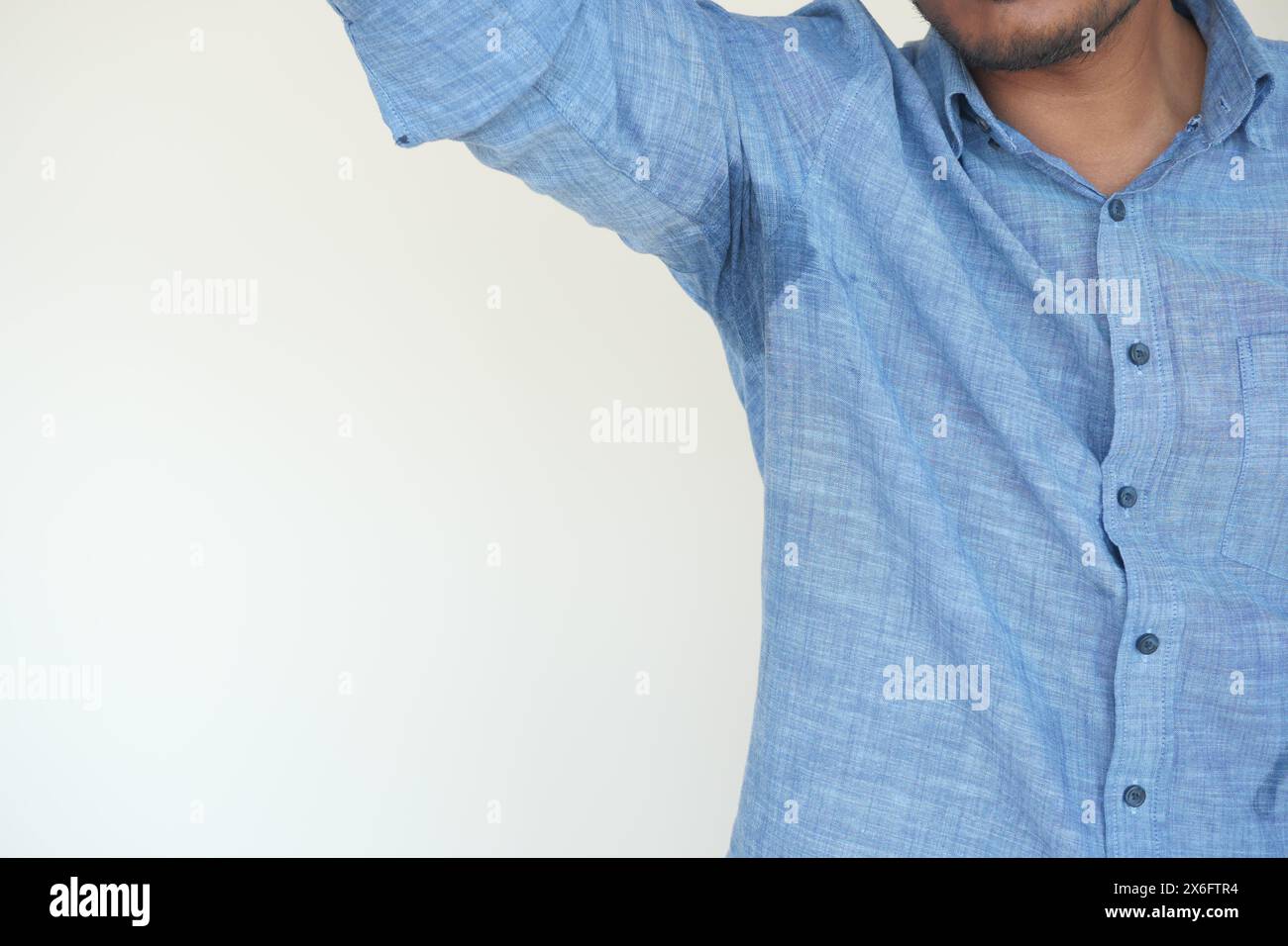 Smelling clothes armpit hi-res stock photography and images - Alamy