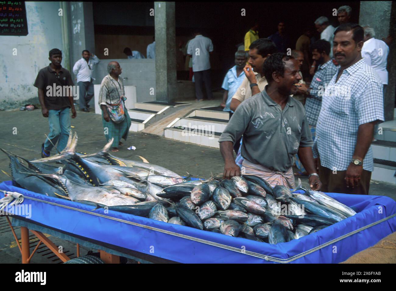 Fishmonger with fish on cart, Male, taken in 2000, Republic of Maldives ...