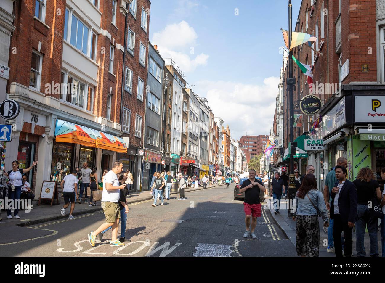 Old Compton street in central London,busy London street scene on ...