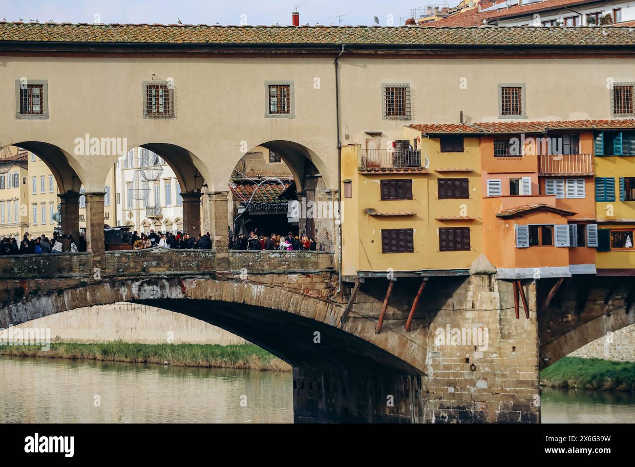 The Ponte Vecchio, a medieval stone closed-spandrel segmental arch ...