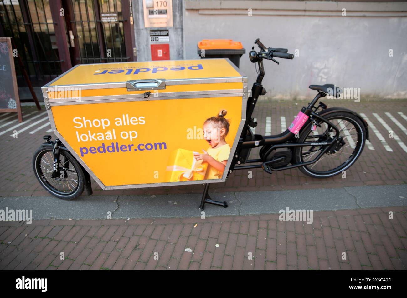Peddler Delivery Bike At Amsterdam The Netherlands 13-5-2024 Stock ...